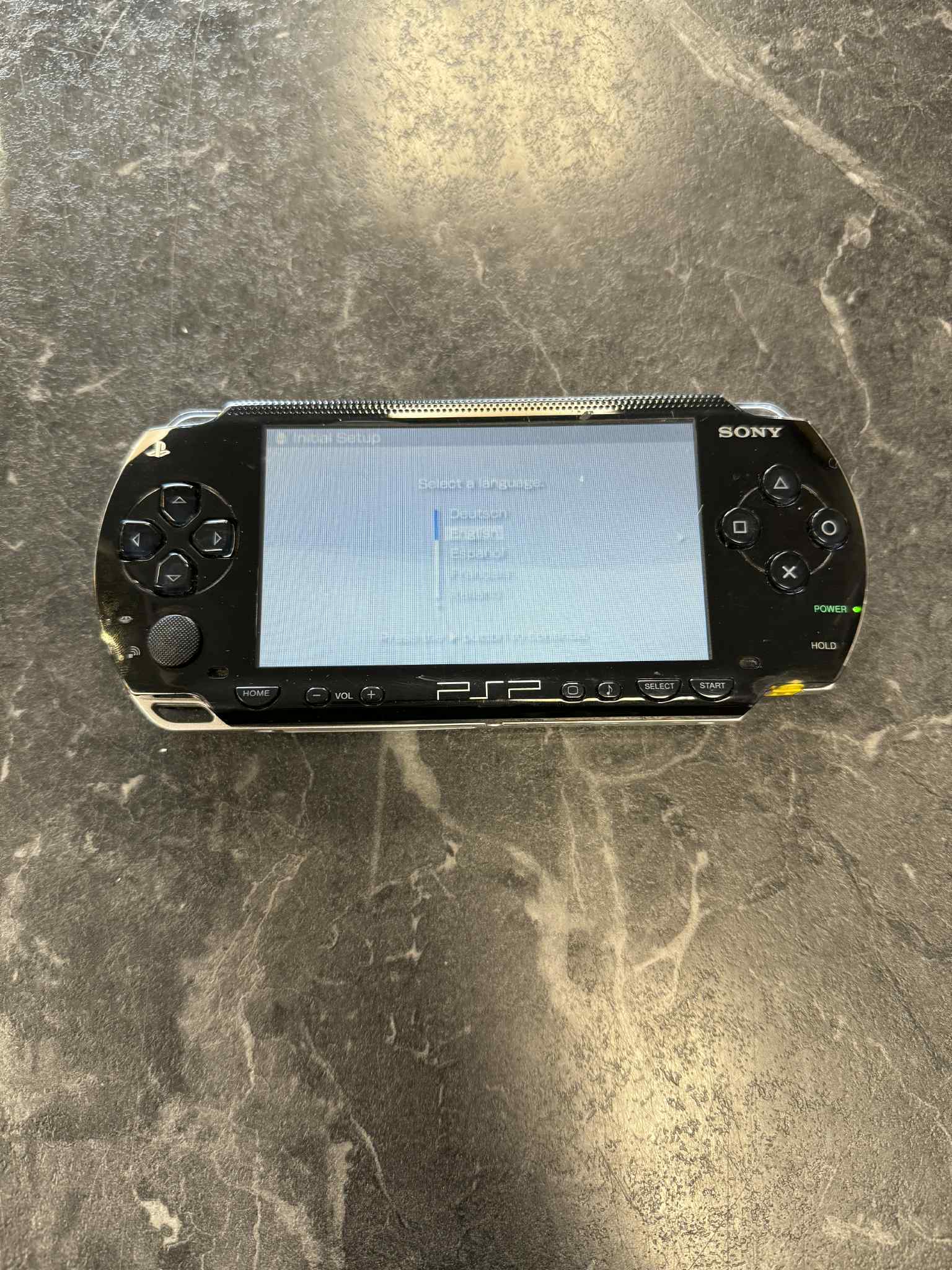 Pre-owned Sony PSP Console and x66 Games Bundle - Tested - Own4Less
